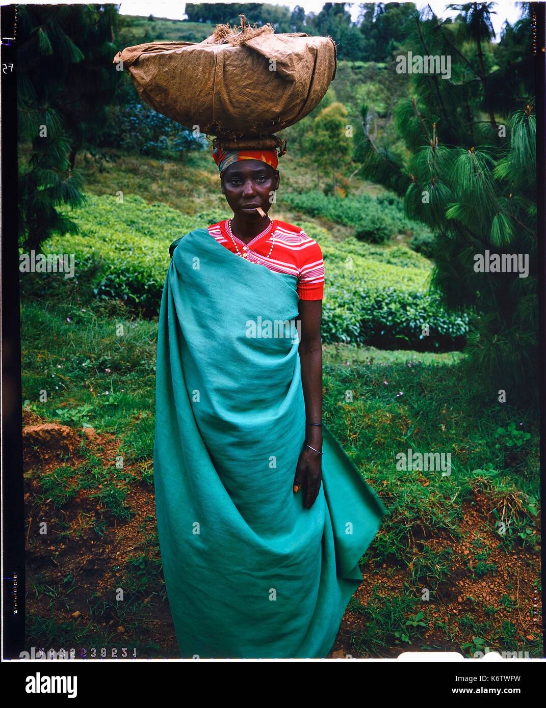 Burundi, Bujumbura Province, Ijenda area, Tutsi woman going to the ...