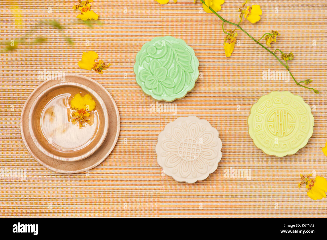 Colorful snow skin mooncake with tea pot on pink background Stock Photo ...