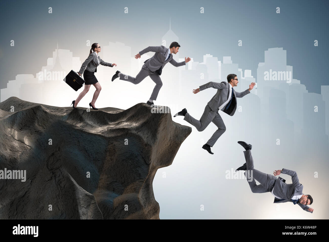 Business people falling off the cliff Stock Photo - Alamy