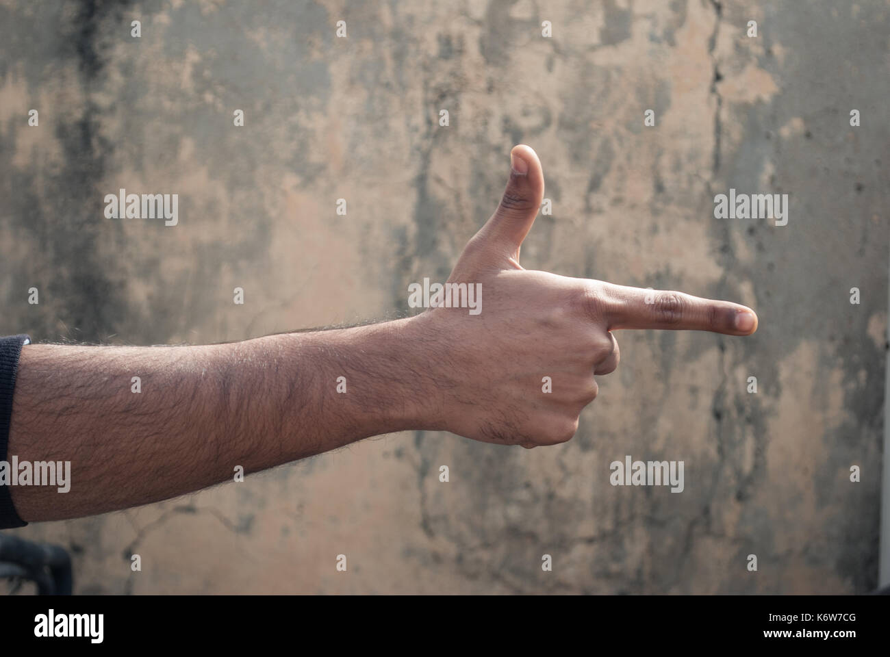 Closeup of hand pointing Stock Photo - Alamy