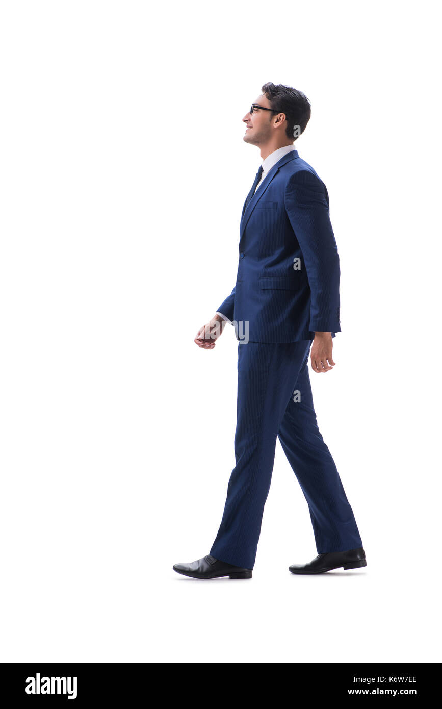 Businessman walking standing side view isolated on white background ...