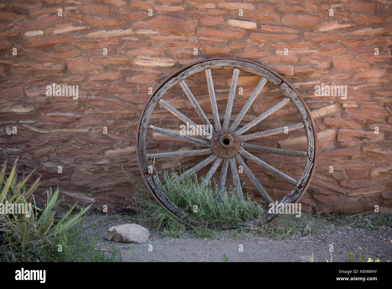 Wooden Wheel on Brick Wall Horizontal Image Stock Photo - Alamy