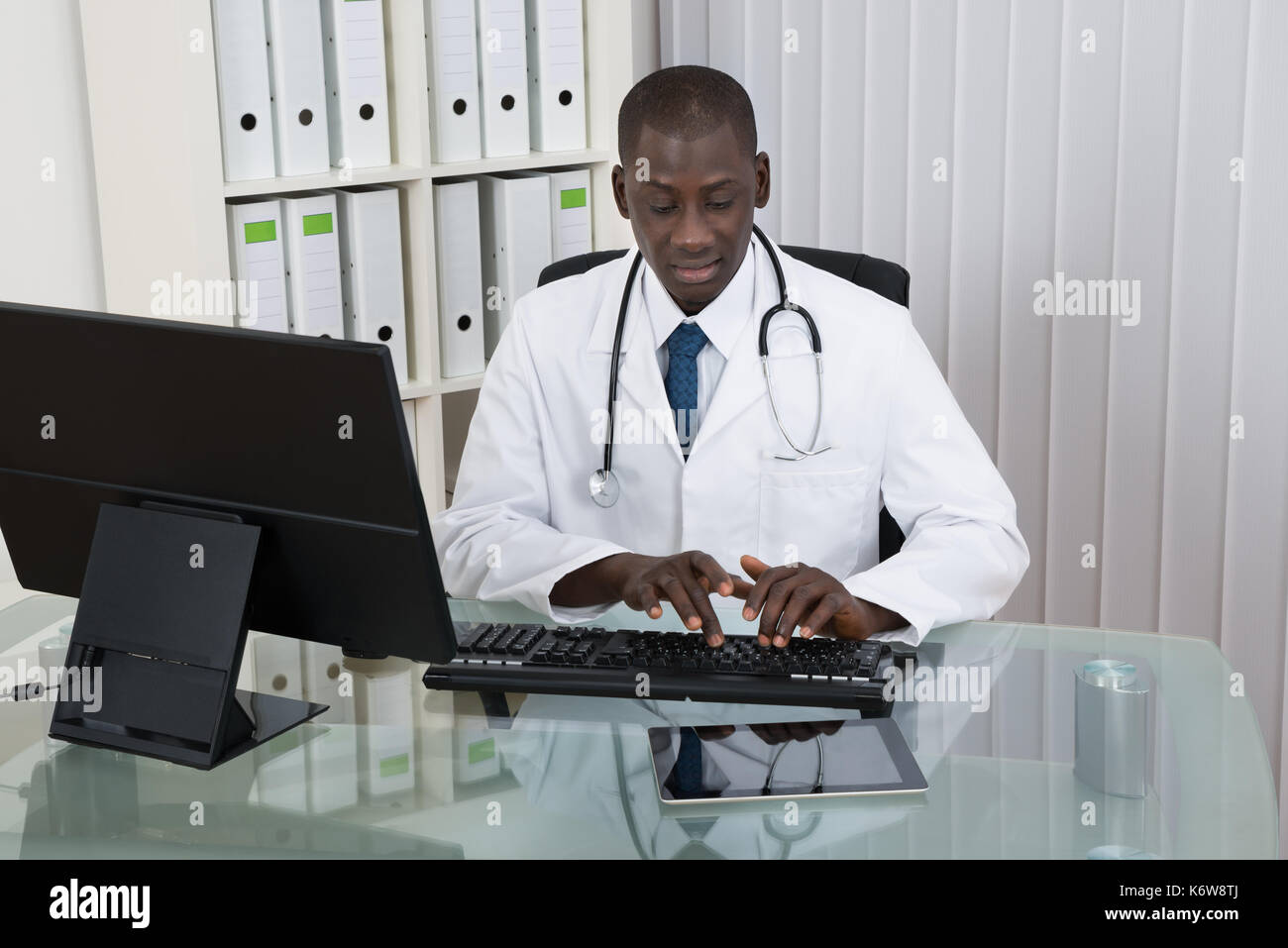 Doctor computer black hi-res stock photography and images - Alamy