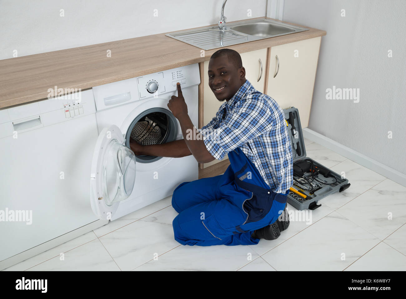 African washing hi-res stock photography and images - Alamy