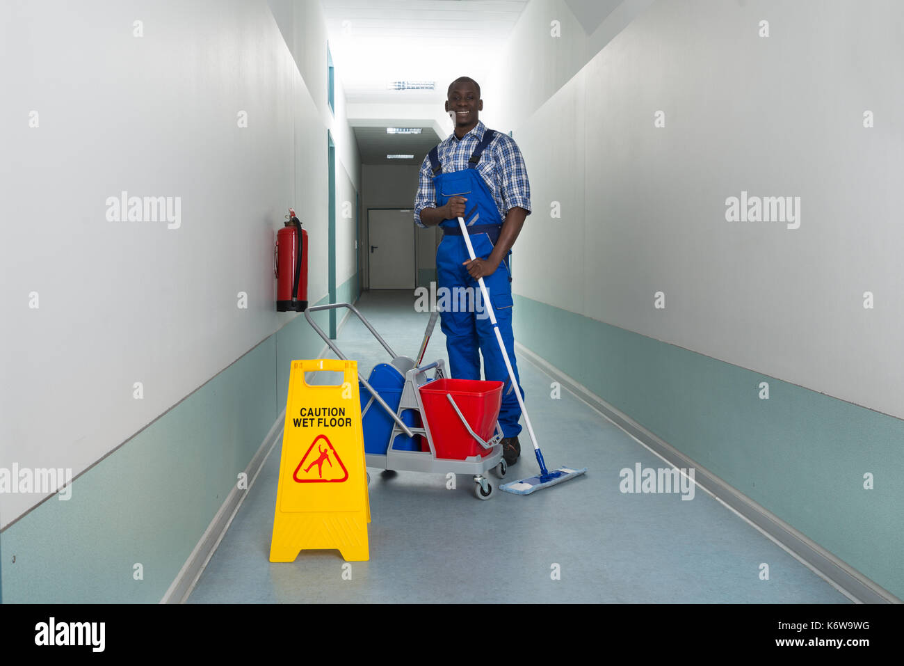 Mop bucket sign hi-res stock photography and images - Alamy