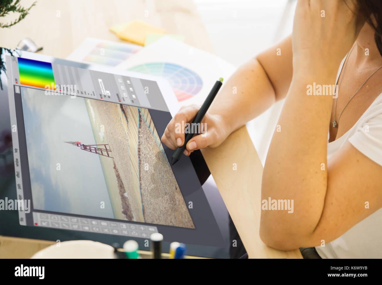 photo editor drawing on a tablet. All screen graphics are made up Stock ...