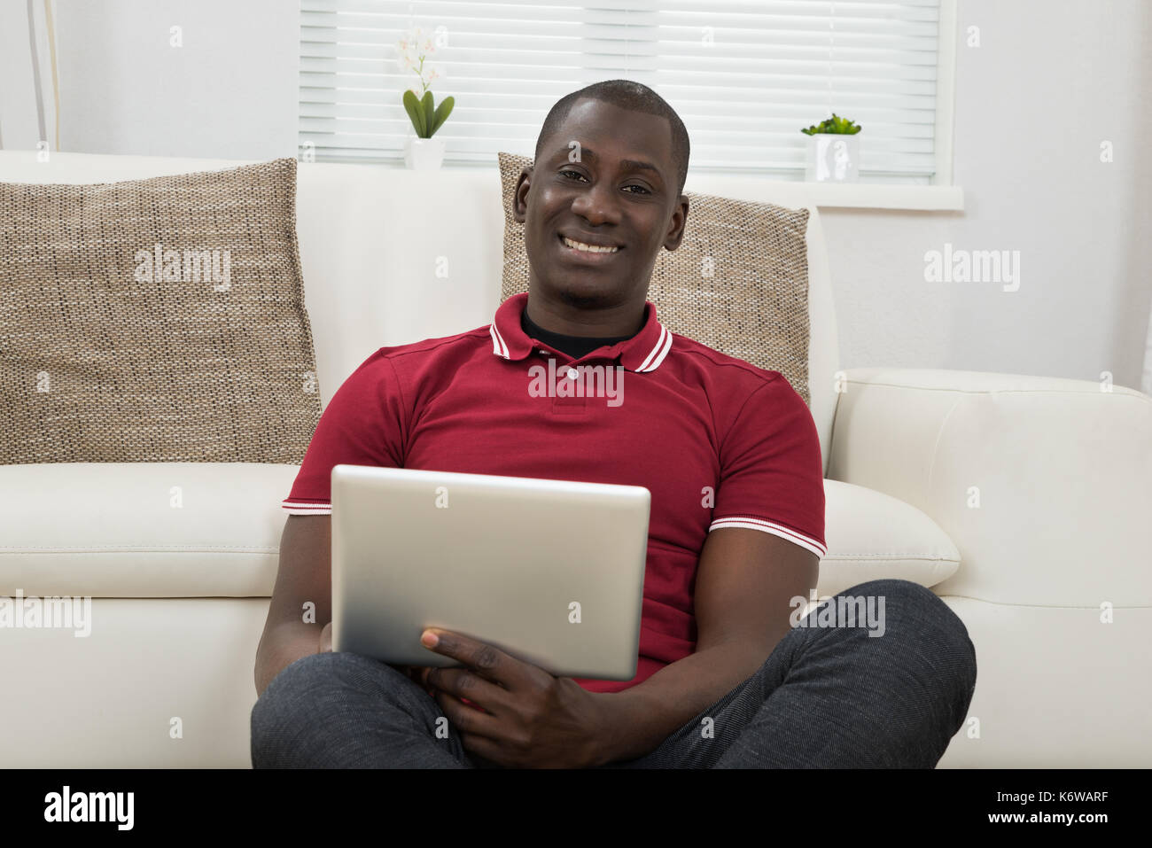 African lifestyle tablet hi-res stock photography and images - Alamy