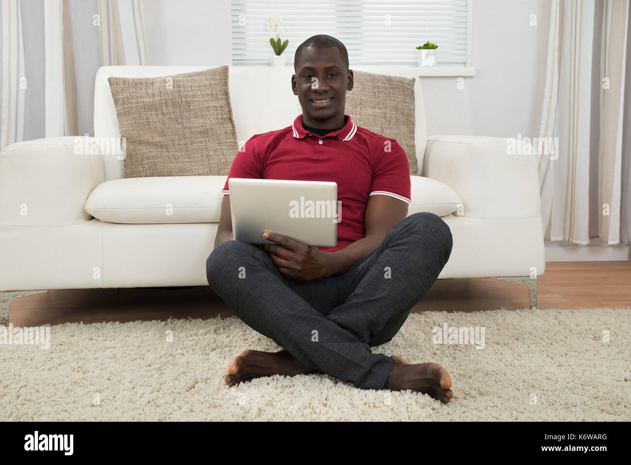 African lifestyle tablet hi-res stock photography and images - Alamy