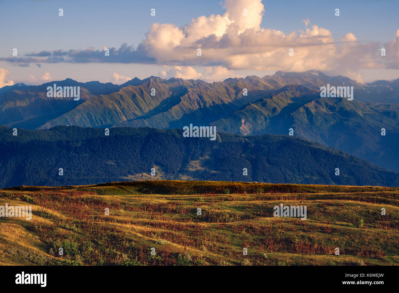 Mountain range landscape view with with beautiful sunset clouds ...