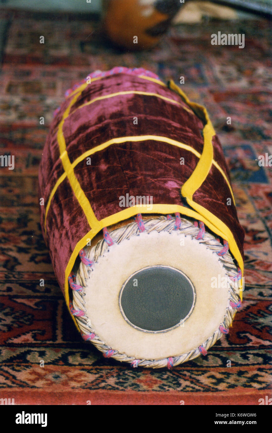 Mridangam, instrument from India - view of head and body wrapped in ...