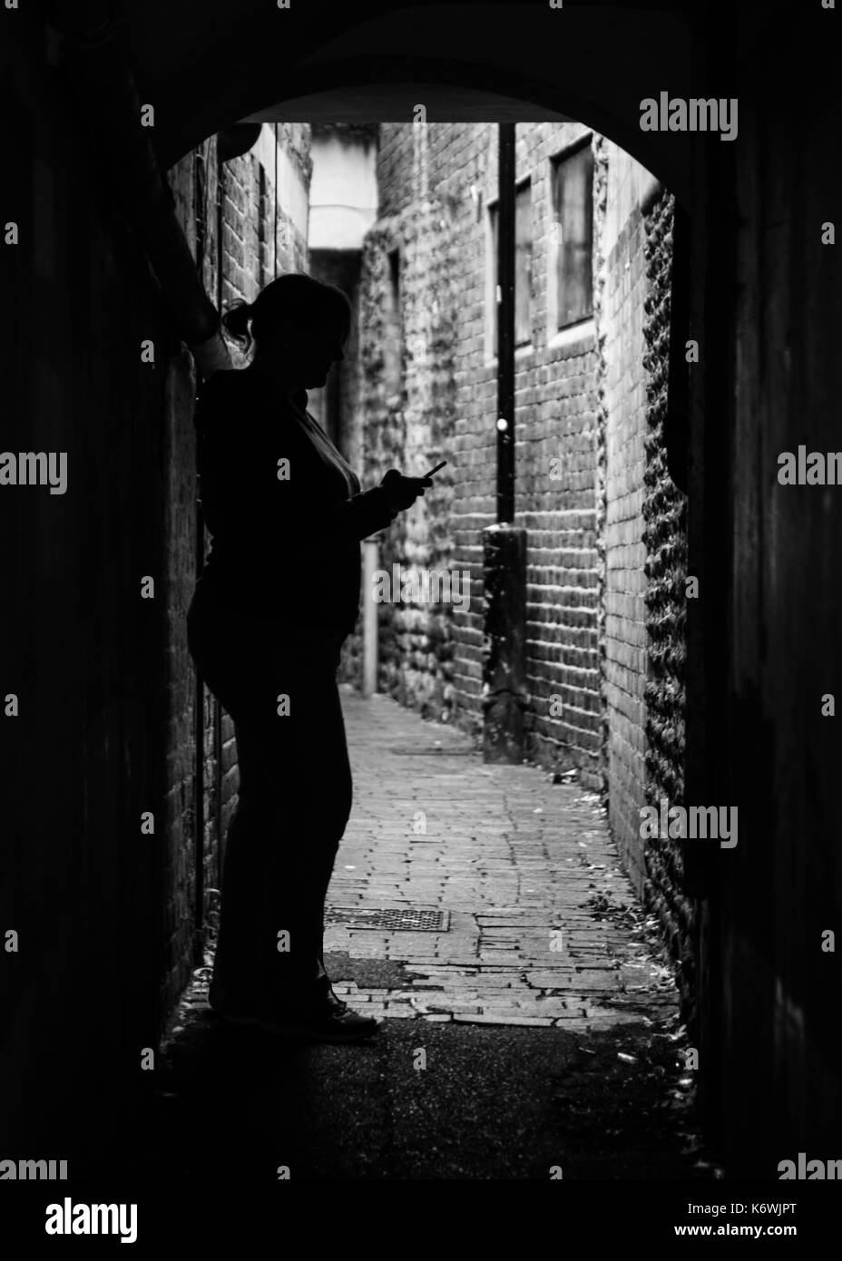 Girl back phone Black and White Stock Photos & Images - Alamy