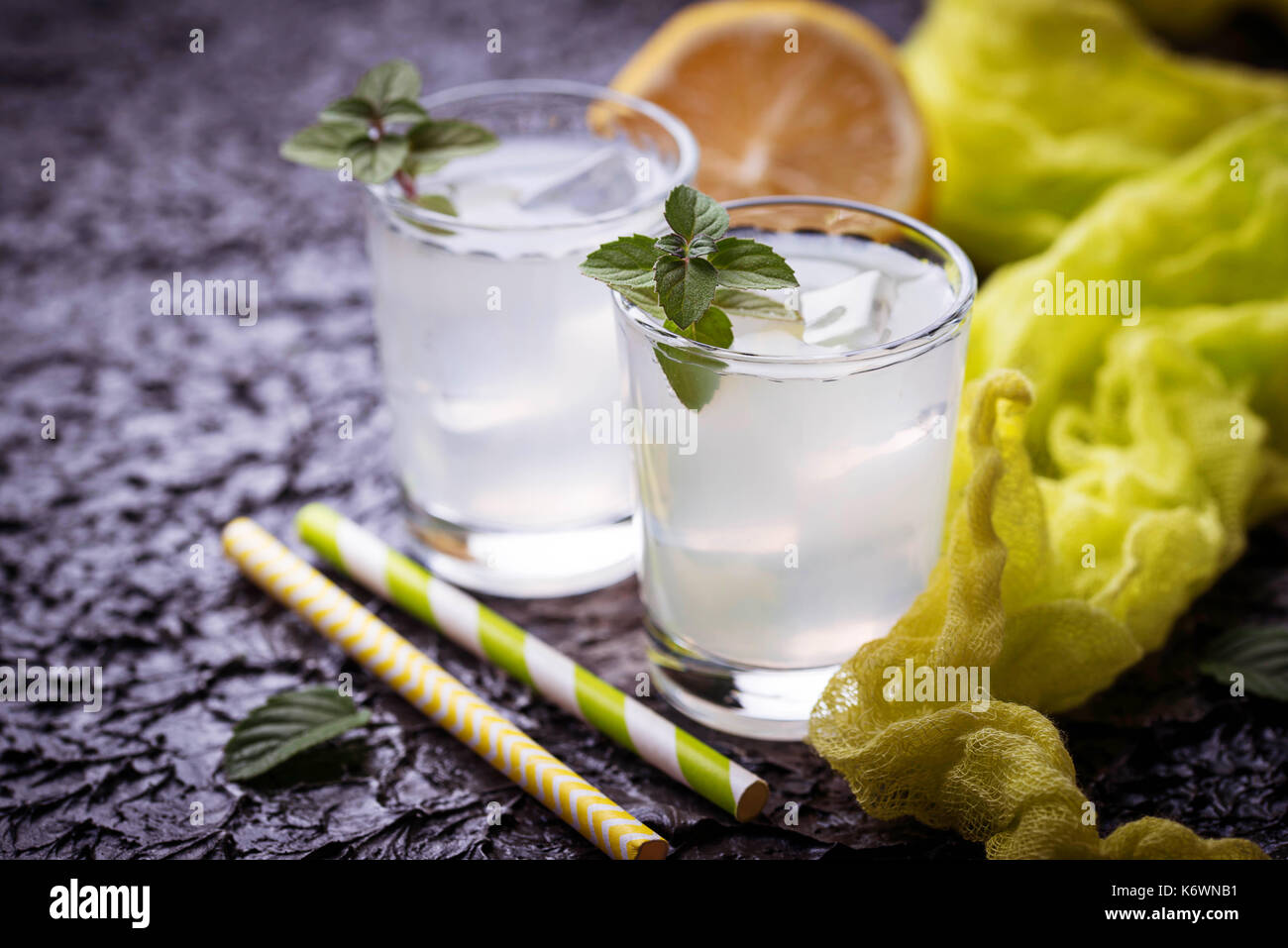 Cold drink with lemon and mint Stock Photo - Alamy