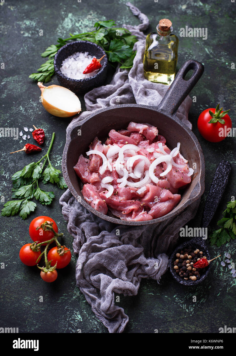 Raw sliced meat ready for cooking Stock Photo - Alamy