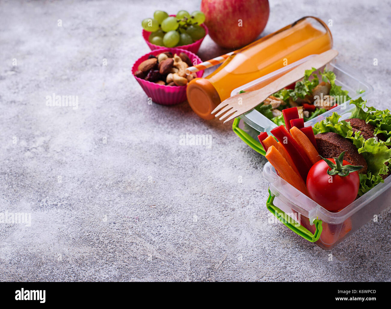 School lunch. Salad, sandwiches, fruits and nuts Stock Photo - Alamy