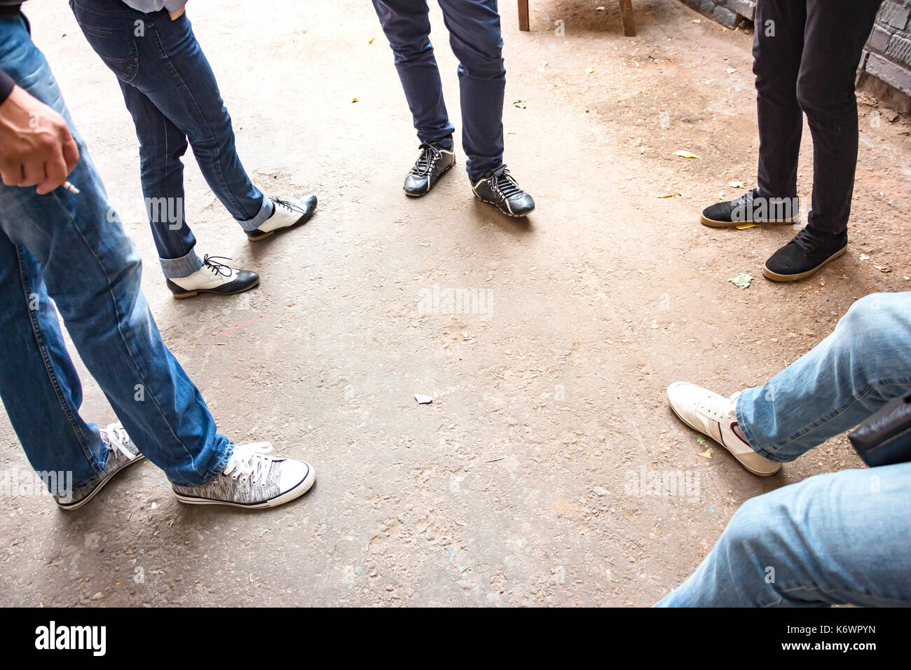Legs of a group of people Stock Photo - Alamy