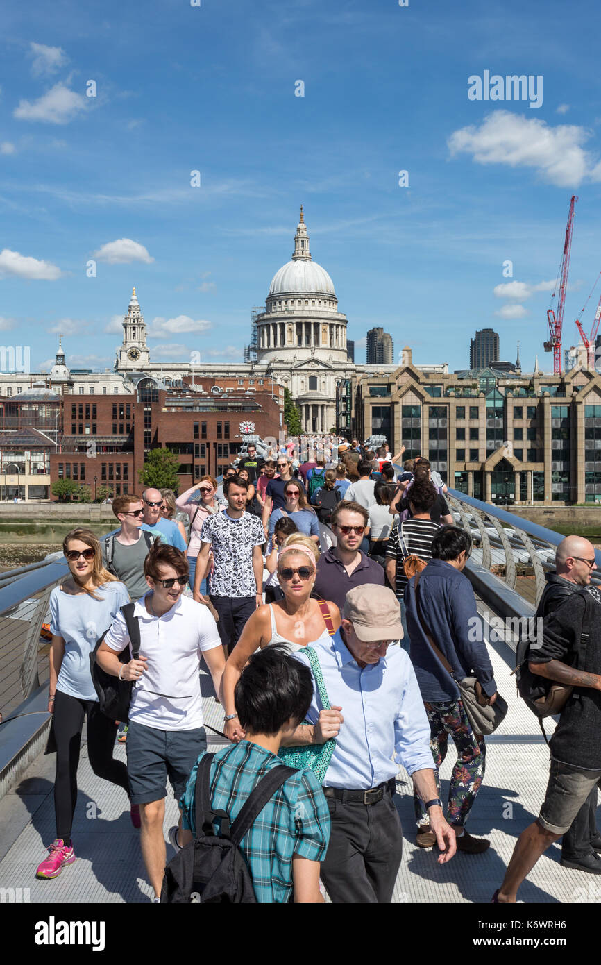 Crowd on footbridge hi-res stock photography and images - Alamy