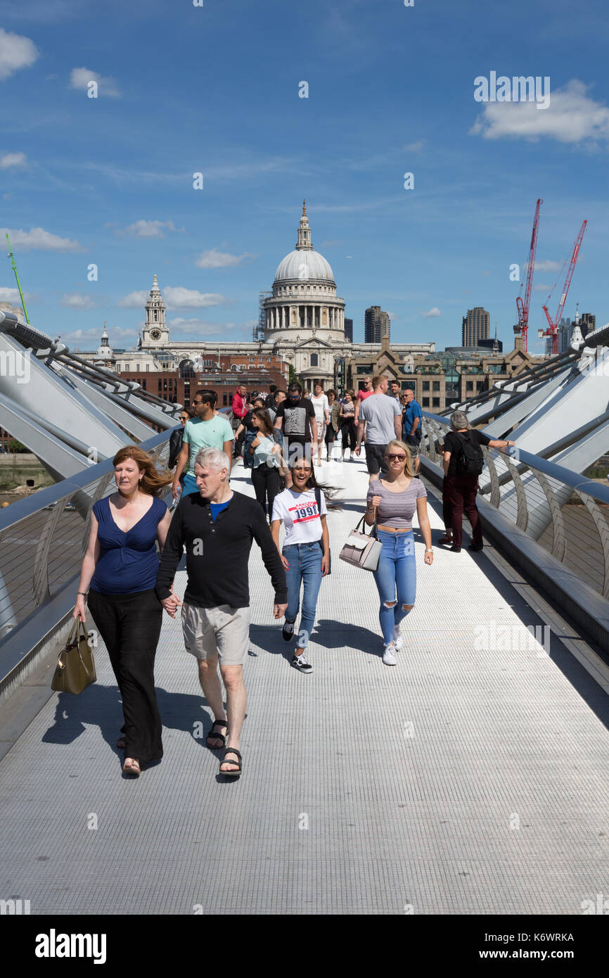People on Millennium Bridge, London, UK Stock Photo - Alamy