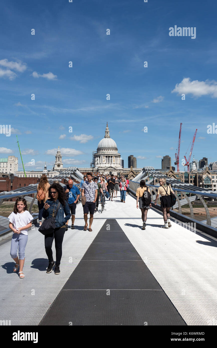 Crowd on footbridge hi-res stock photography and images - Alamy