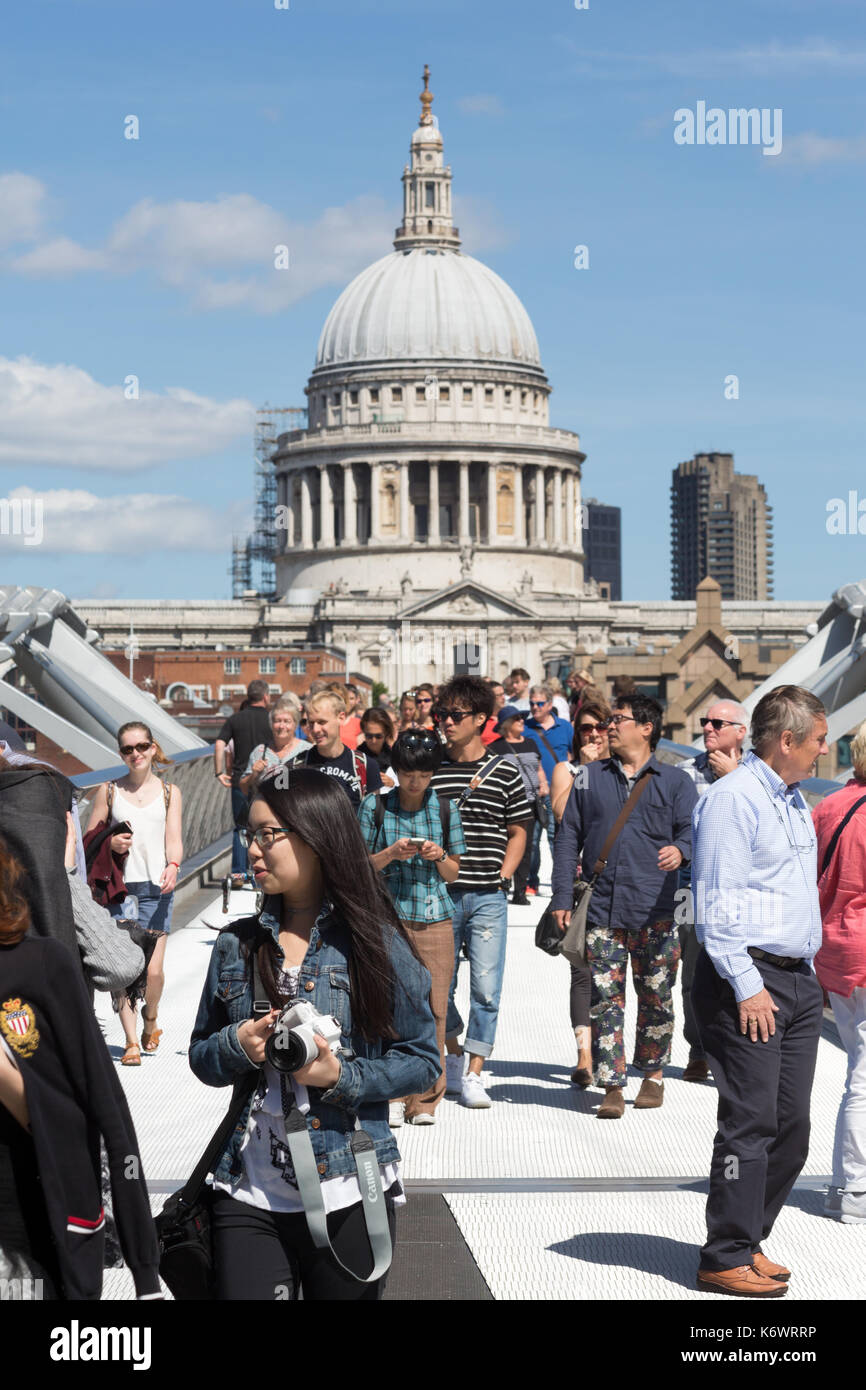 People on Millennium Bridge, London, UK Stock Photo - Alamy
