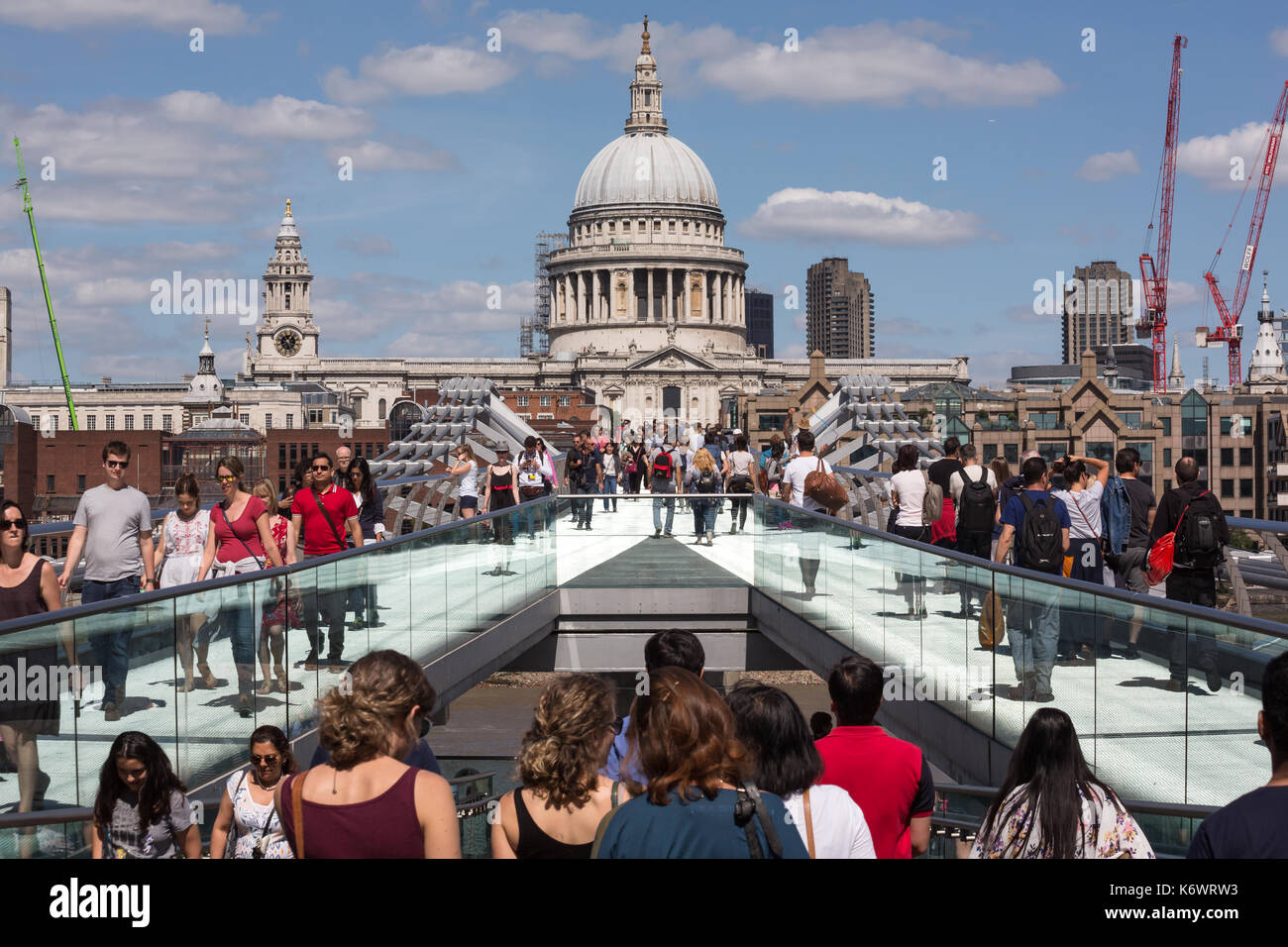 Crowd on footbridge hi-res stock photography and images - Alamy