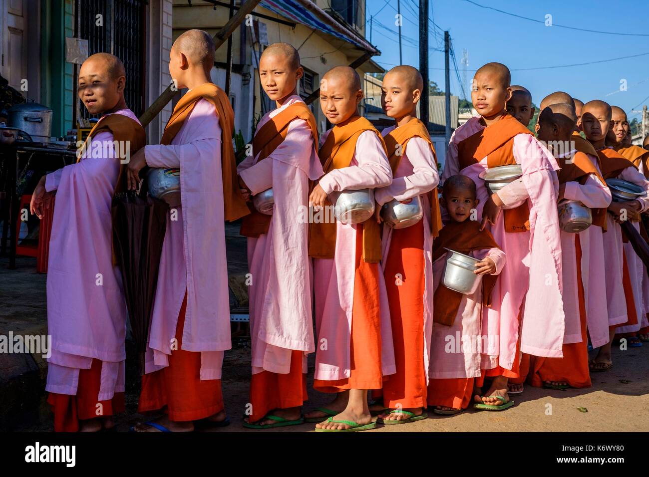 Myanmar (Burma), Shan state, Kyaukme, young buddhist nuns waiting for ...