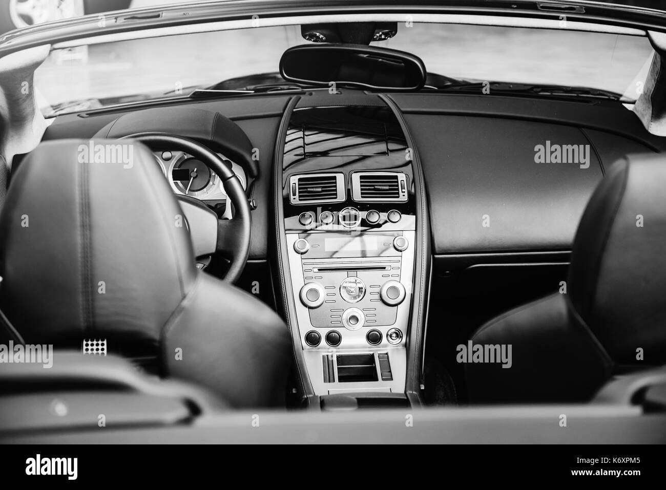 Steering wheel leather seats Black and White Stock Photos & Images - Alamy