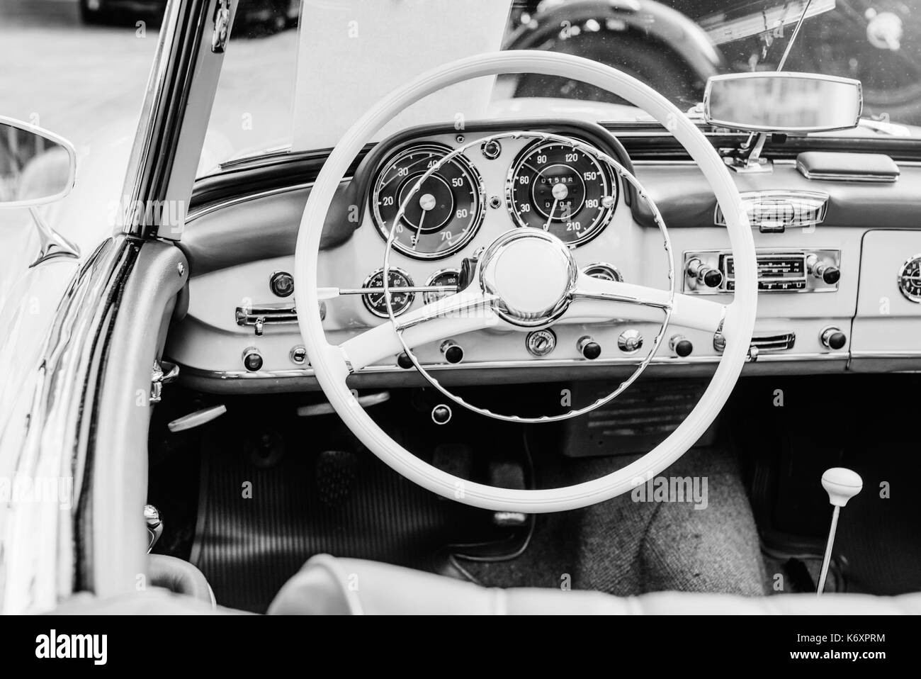 Steering wheel leather seats Black and White Stock Photos & Images - Alamy