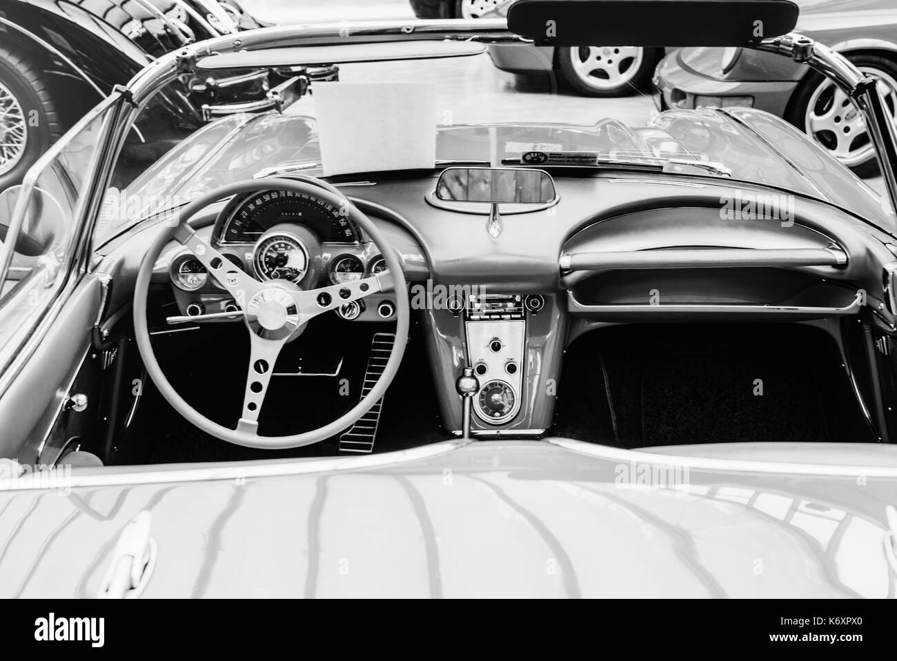 Steering wheel leather seats Black and White Stock Photos & Images - Alamy