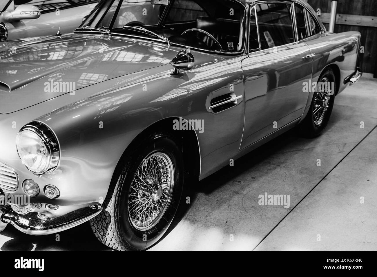 view of luxury vintage car silver color on exhibition in the showroom ...