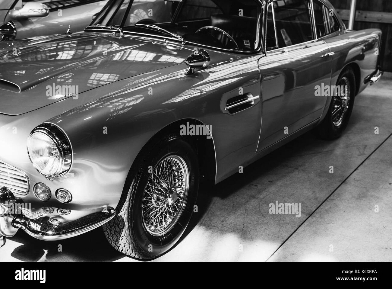 view of luxury vintage car silver color on exhibition in the showroom ...