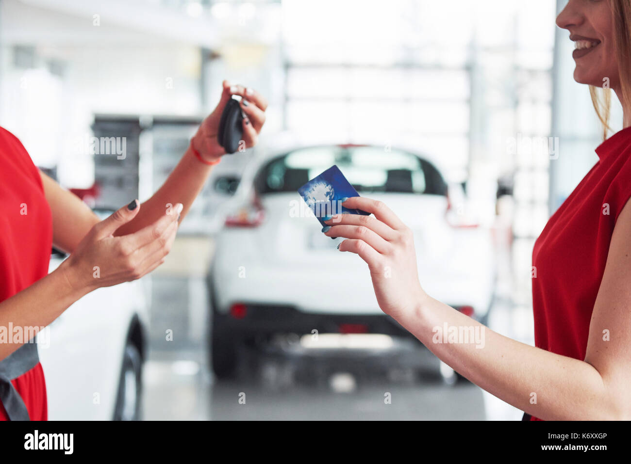 Handing over the car keys hi-res stock photography and images - Alamy