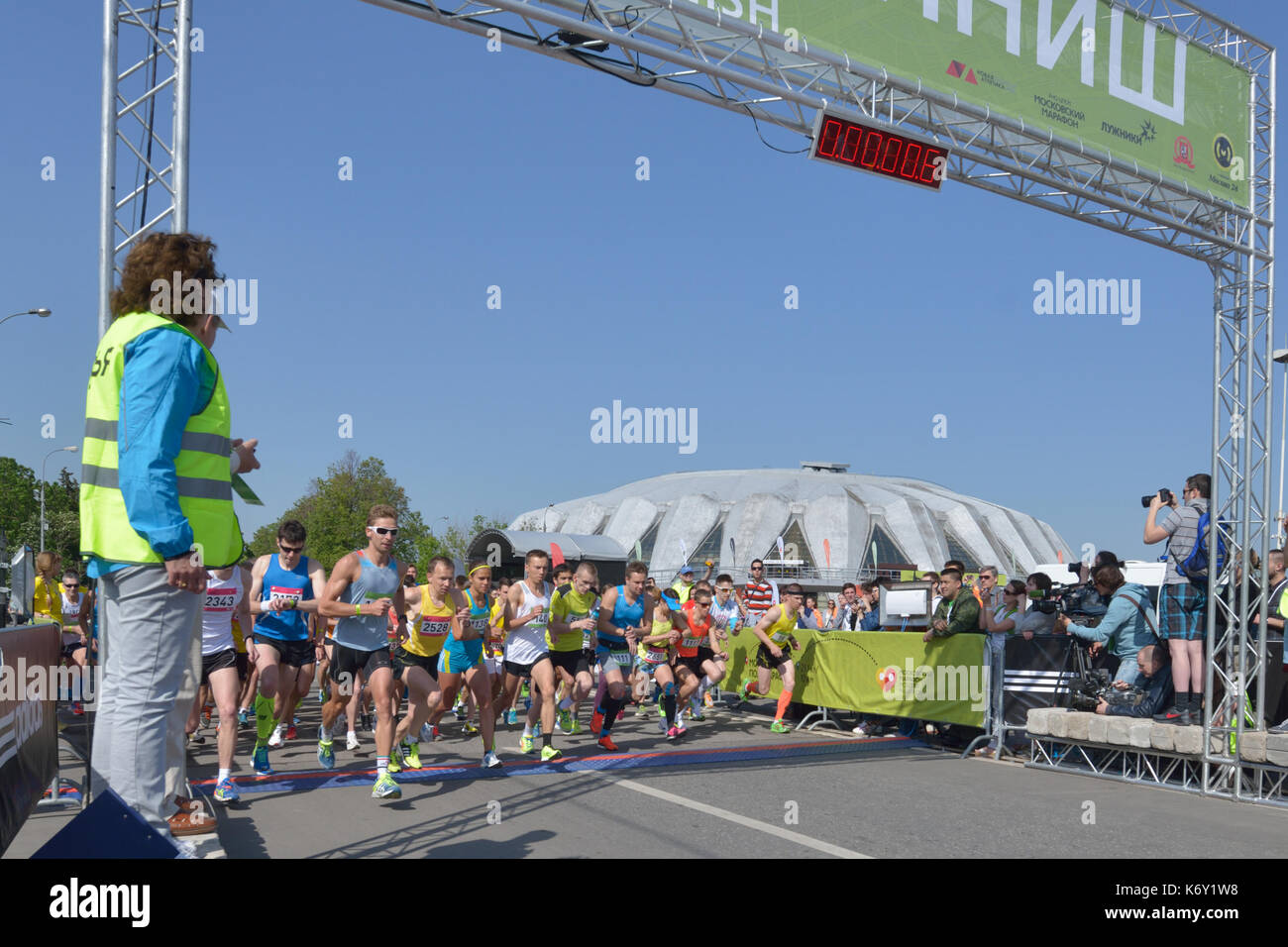 Male Female Athletes Running Marathon Race High Resolution Stock ...