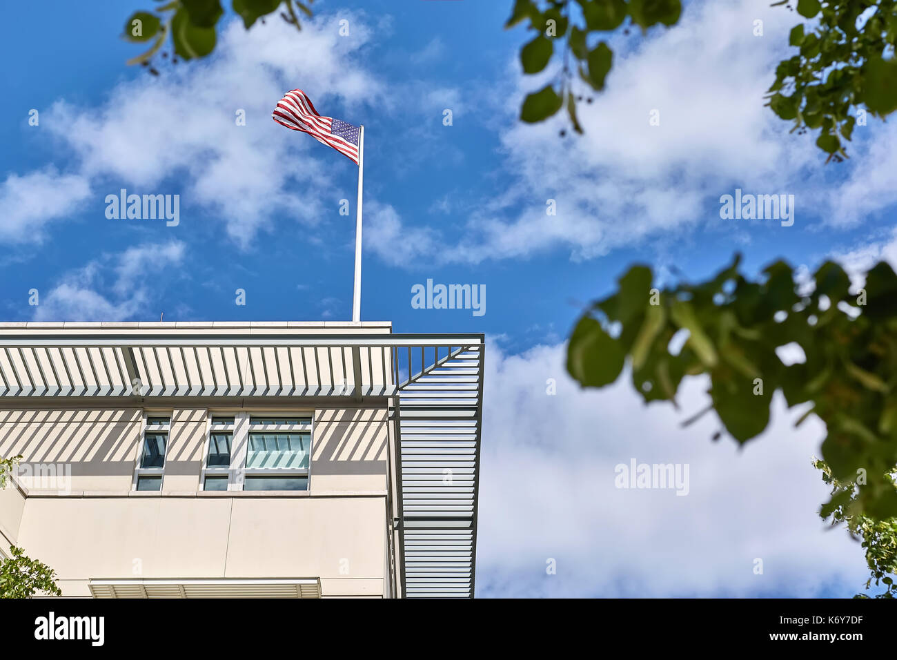 USA flag on roof of embassy Stock Photo - Alamy