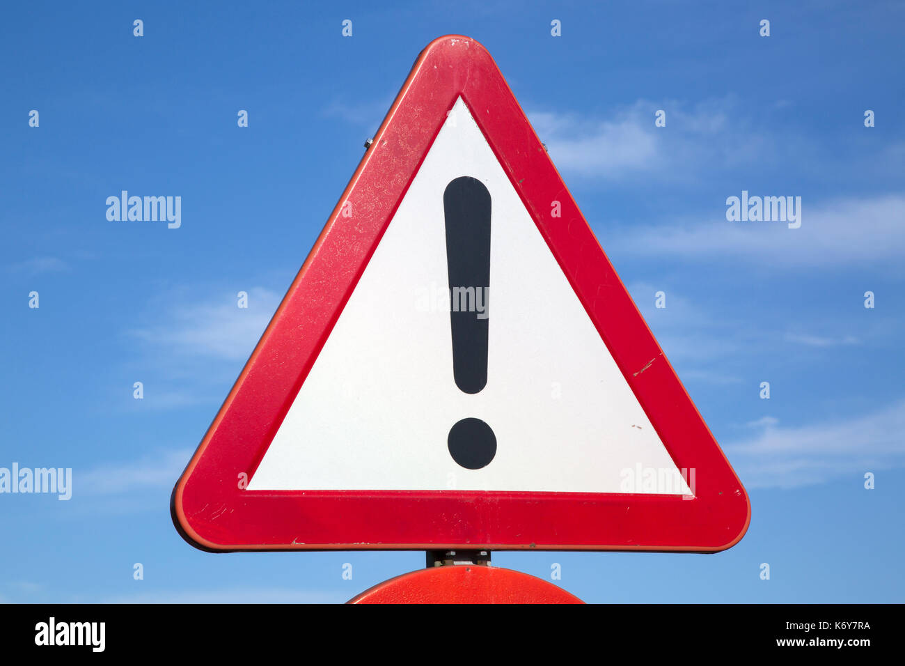 Red and White Triangle Traffic Warning Sign Stock Photo - Alamy