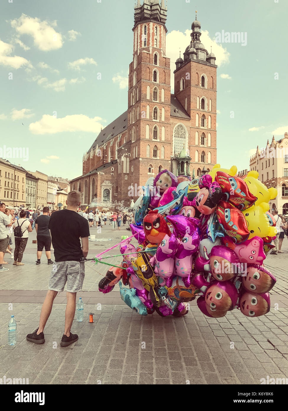 Male street vendor sells colorful popular cartoon character heli Stock ...