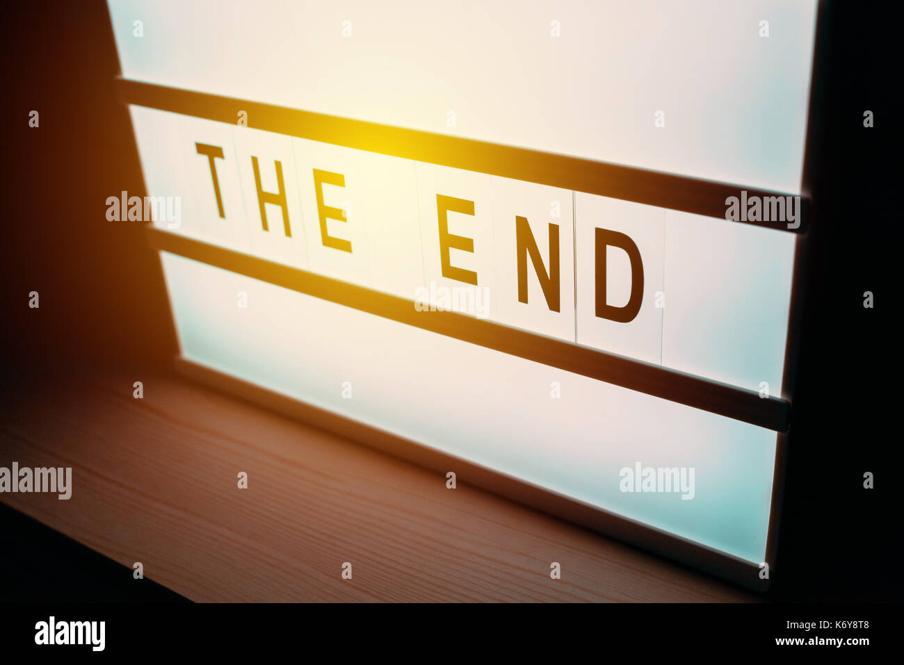 Blinking lightbox signage with The End text Stock Photo - Alamy
