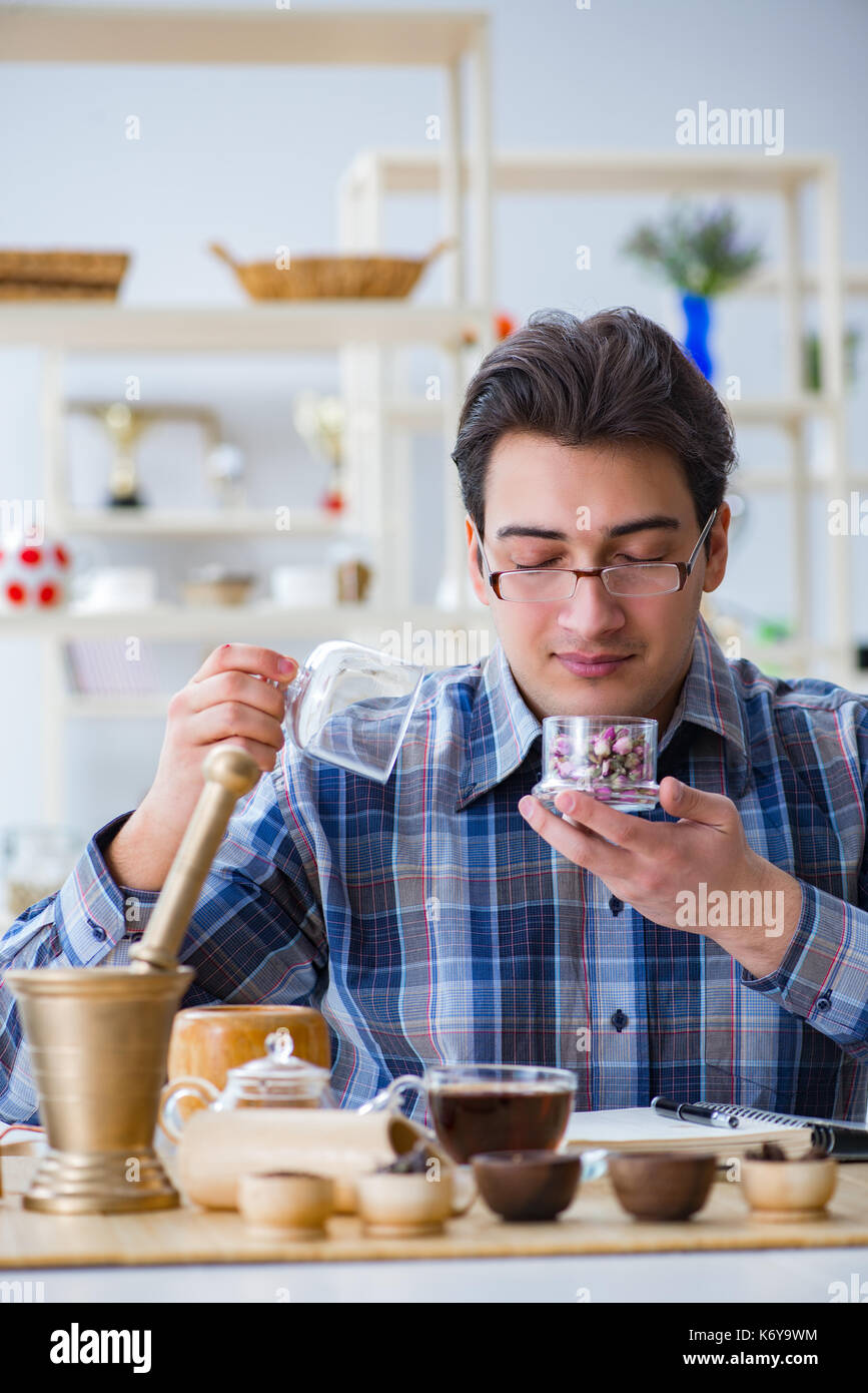 Tea expert brewing cup of drink hi-res stock photography and images - Alamy