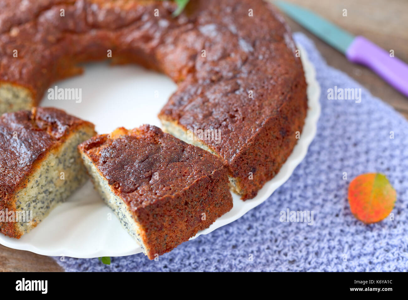 Round cake with poppy seeds Stock Photo - Alamy