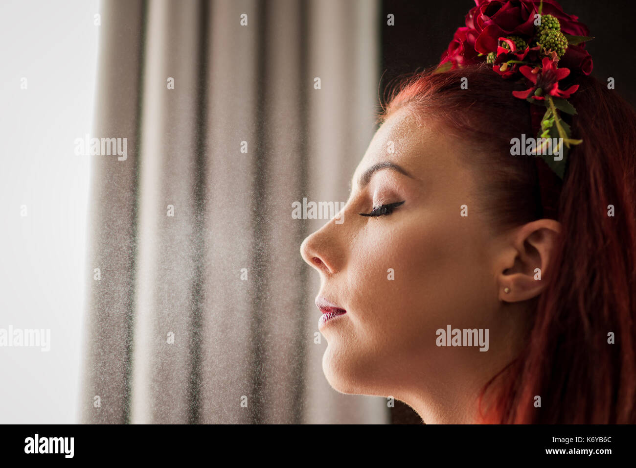 Bride getting ready and spraying perfume all over Stock Photo - Alamy