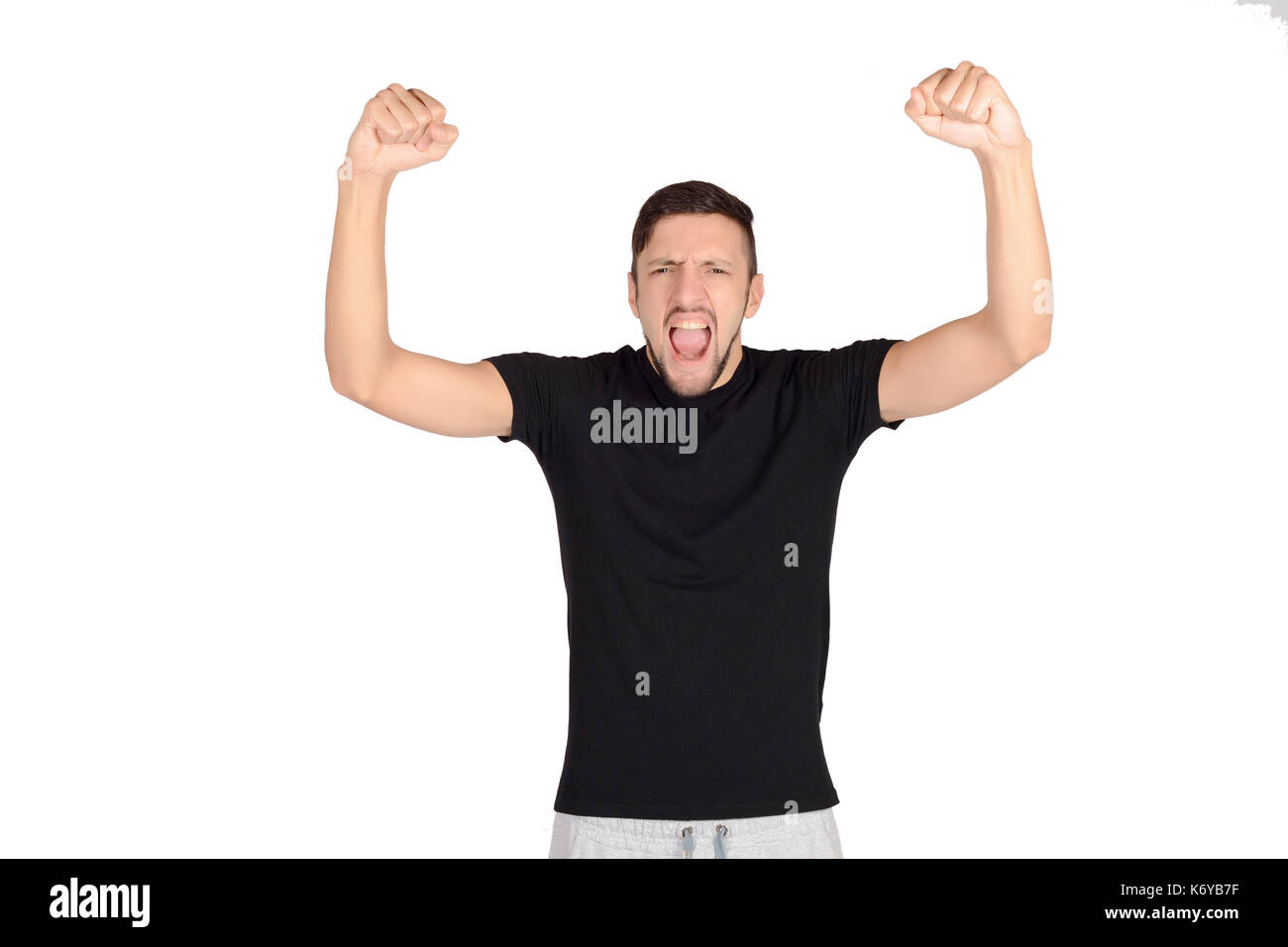 Portrait of a young latin man celebration victory. Isolated white ...