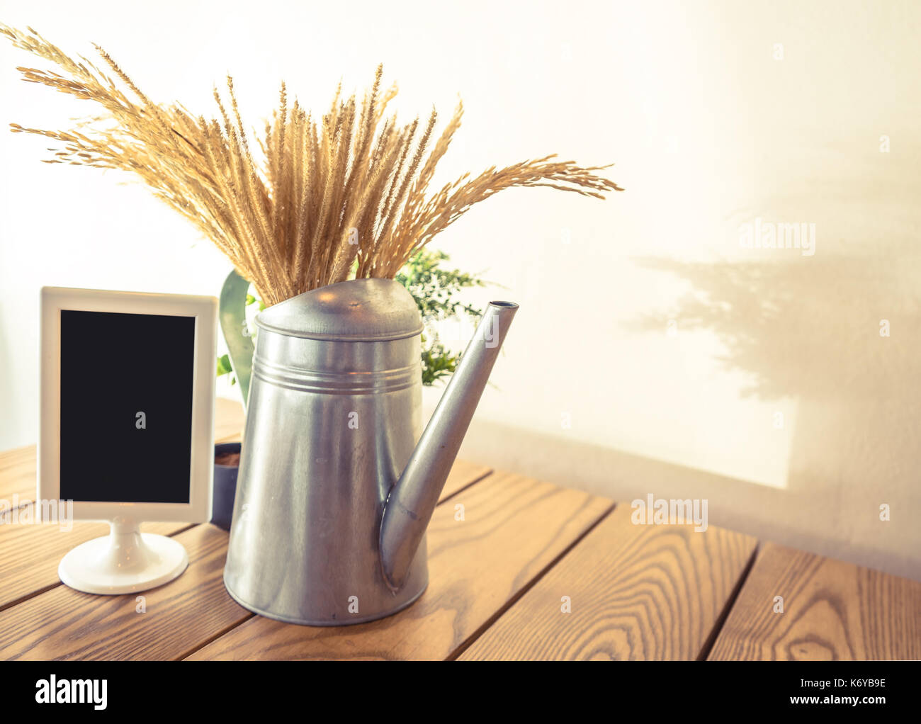 blank sign with ear of rice in vase on the table Stock Photo - Alamy