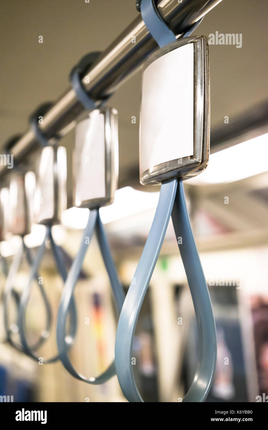 Blank sign with Handles for standing passenger inside a train Stock ...