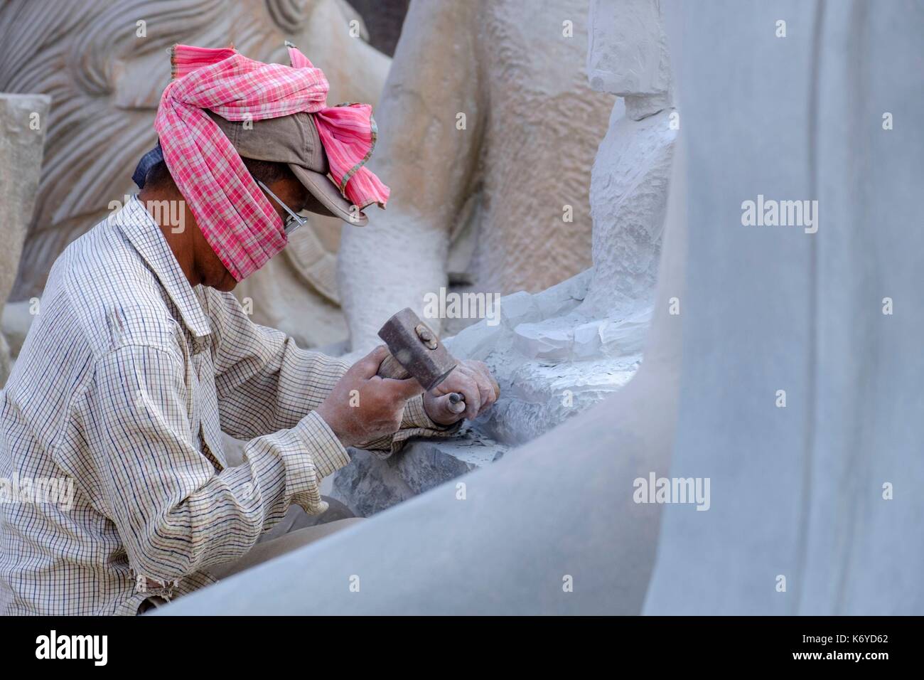 Cambodia, handicraft, stone sculpture of a Buddha head Stock Photo - Alamy