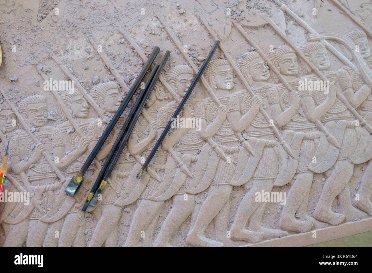 Cambodia, handicraft, stone sculpture of a fresco Stock Photo - Alamy