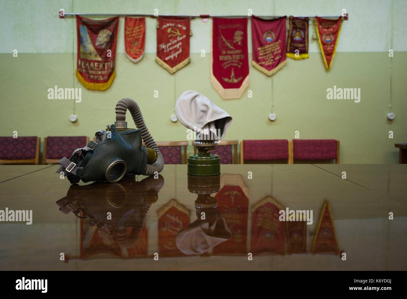 Bunker conference room with soviet era banners and gasmasks hi-res ...