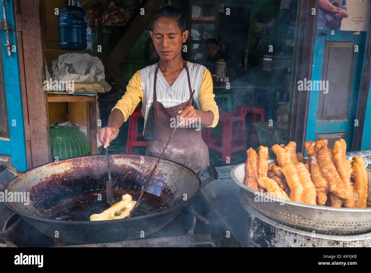 Myanmar (Burma), Chin State, Mindat, shop selling donuts Stock Photo ...