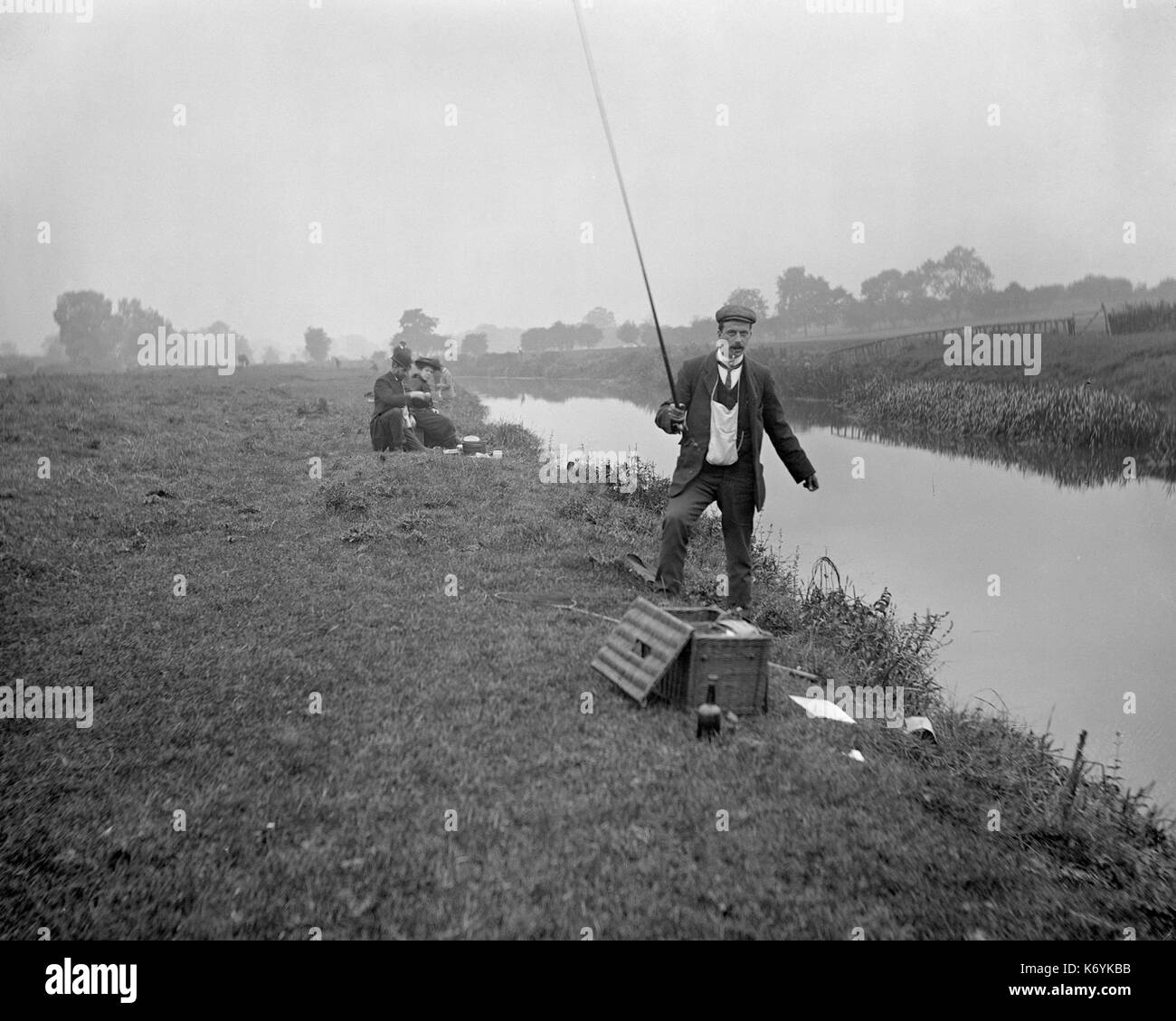 Fishing rod fish line Black and White Stock Photos & Images - Alamy