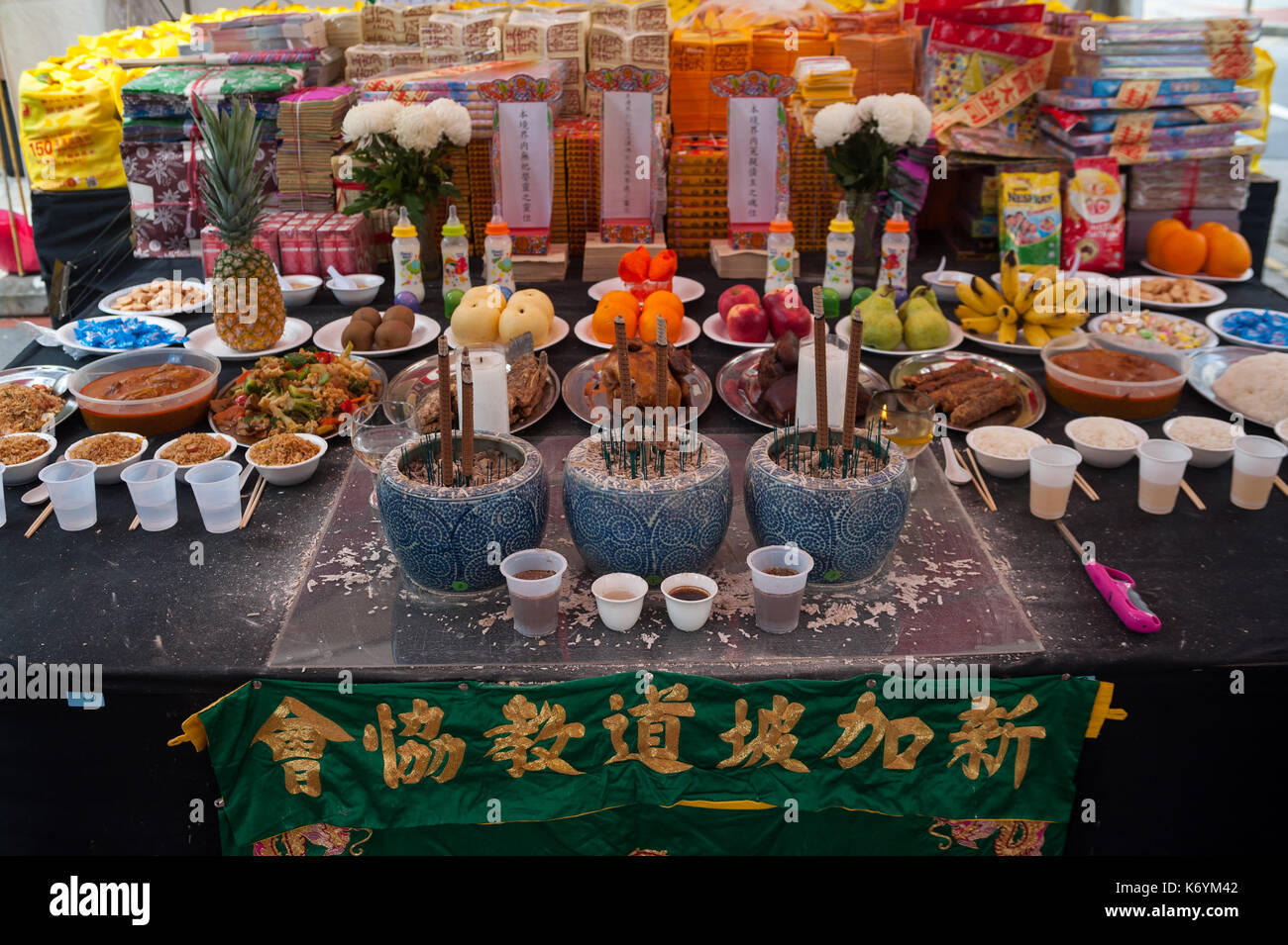 Buddhist food offering altar hi-res stock photography and images - Alamy
