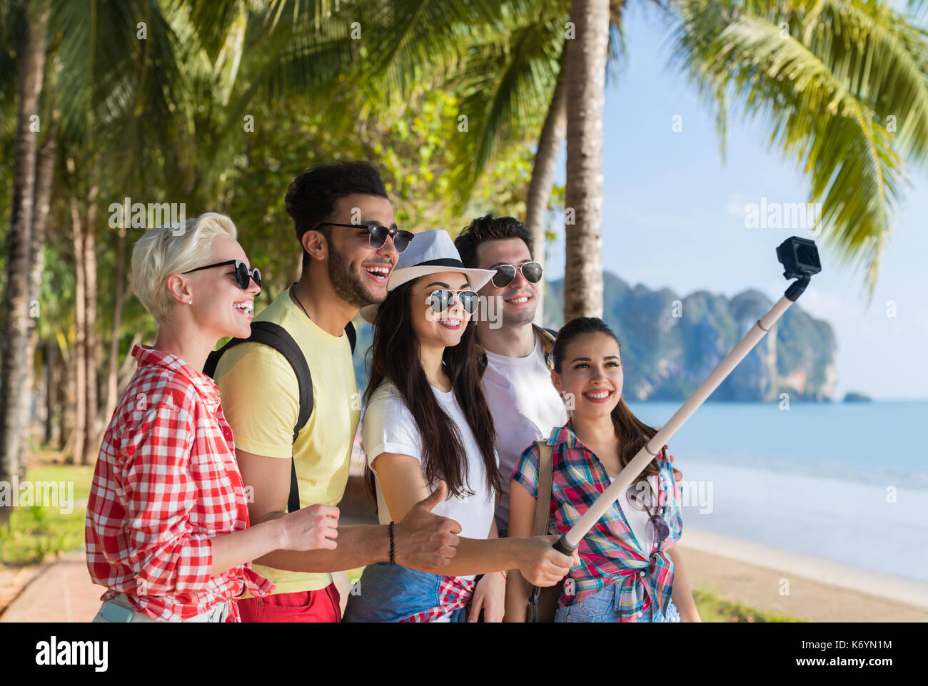 Selfie stick group beach hi-res stock photography and images - Alamy
