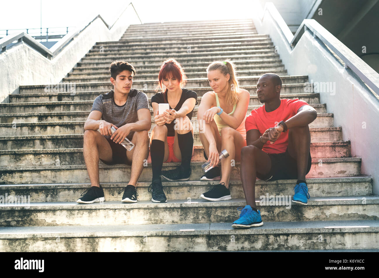 Young man sitting track hi-res stock photography and images - Alamy